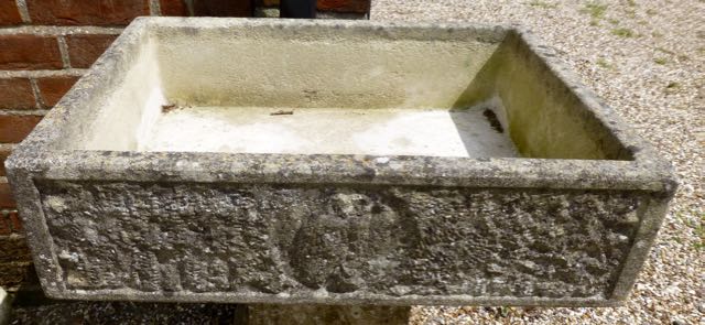 Old manhole cover planter. from Garden Furniture - Antiques by Design